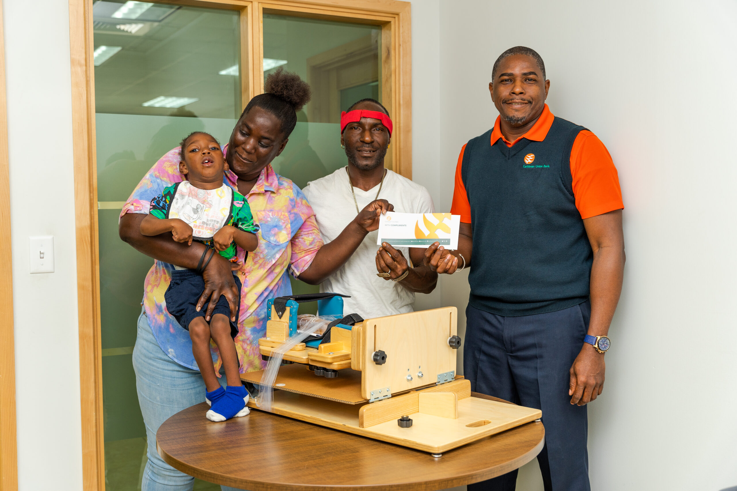 Caribbean Union Bank donates Therapeutic Stander to Justice Daniels ...